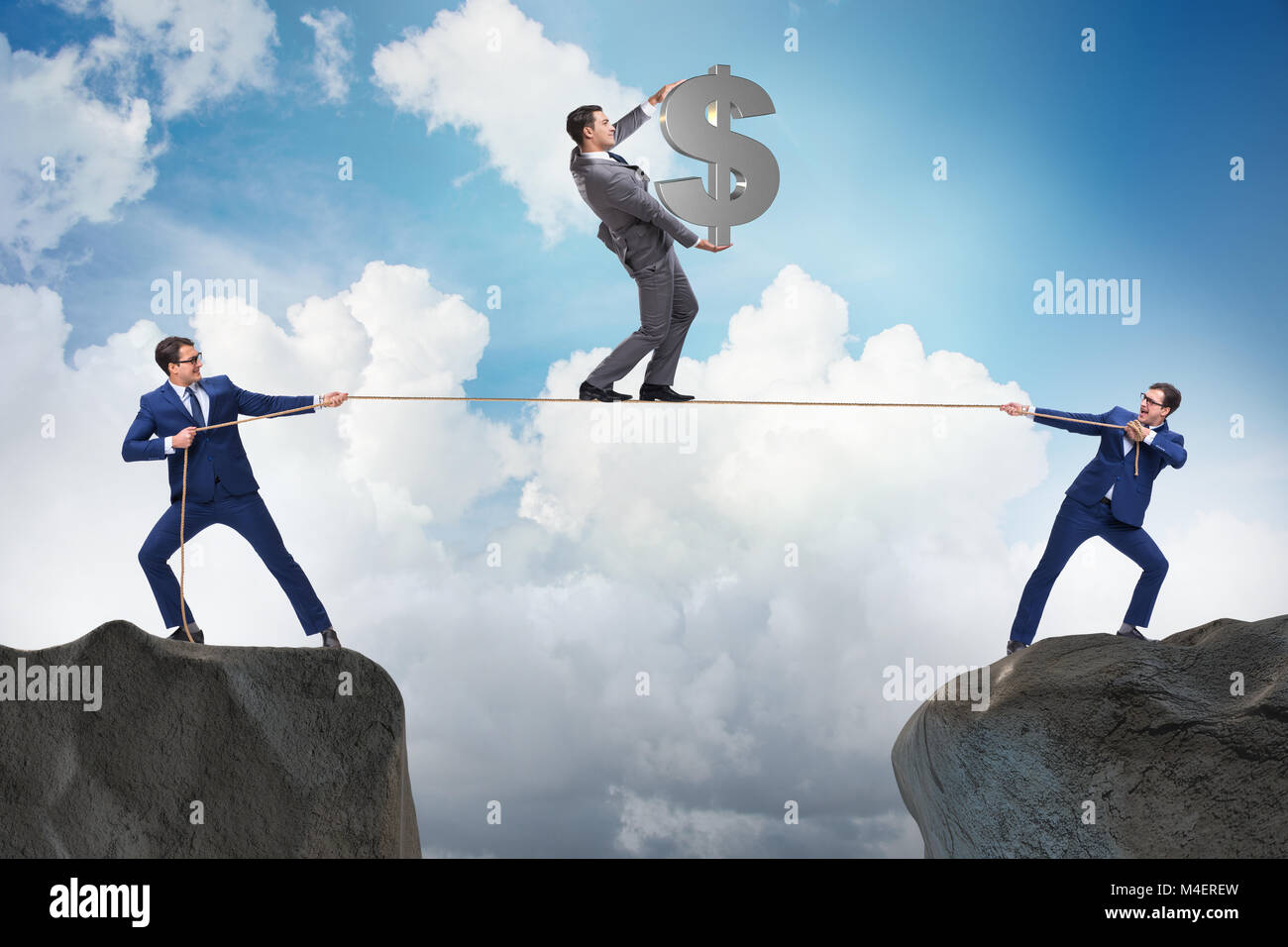 Businessman walking on tight rope Stock Photo - Alamy