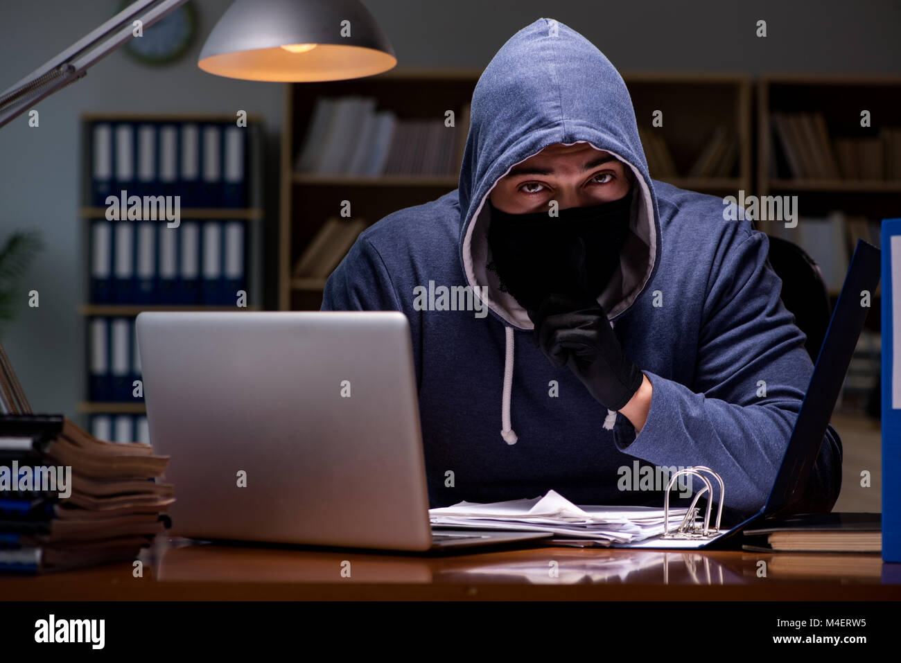 Hacker stealing personal data from home computer Stock Photo - Alamy