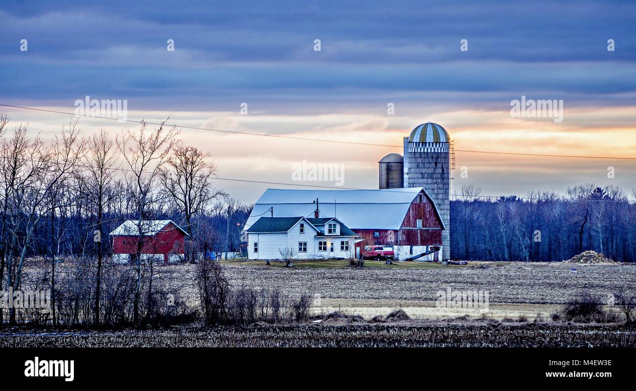 american country farm at sunset Stock Photo - Alamy