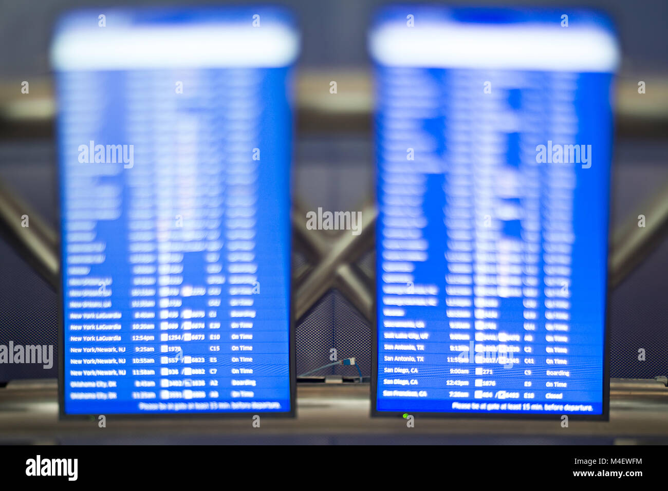 digital airport flight information flip board screens Stock Photo - Alamy