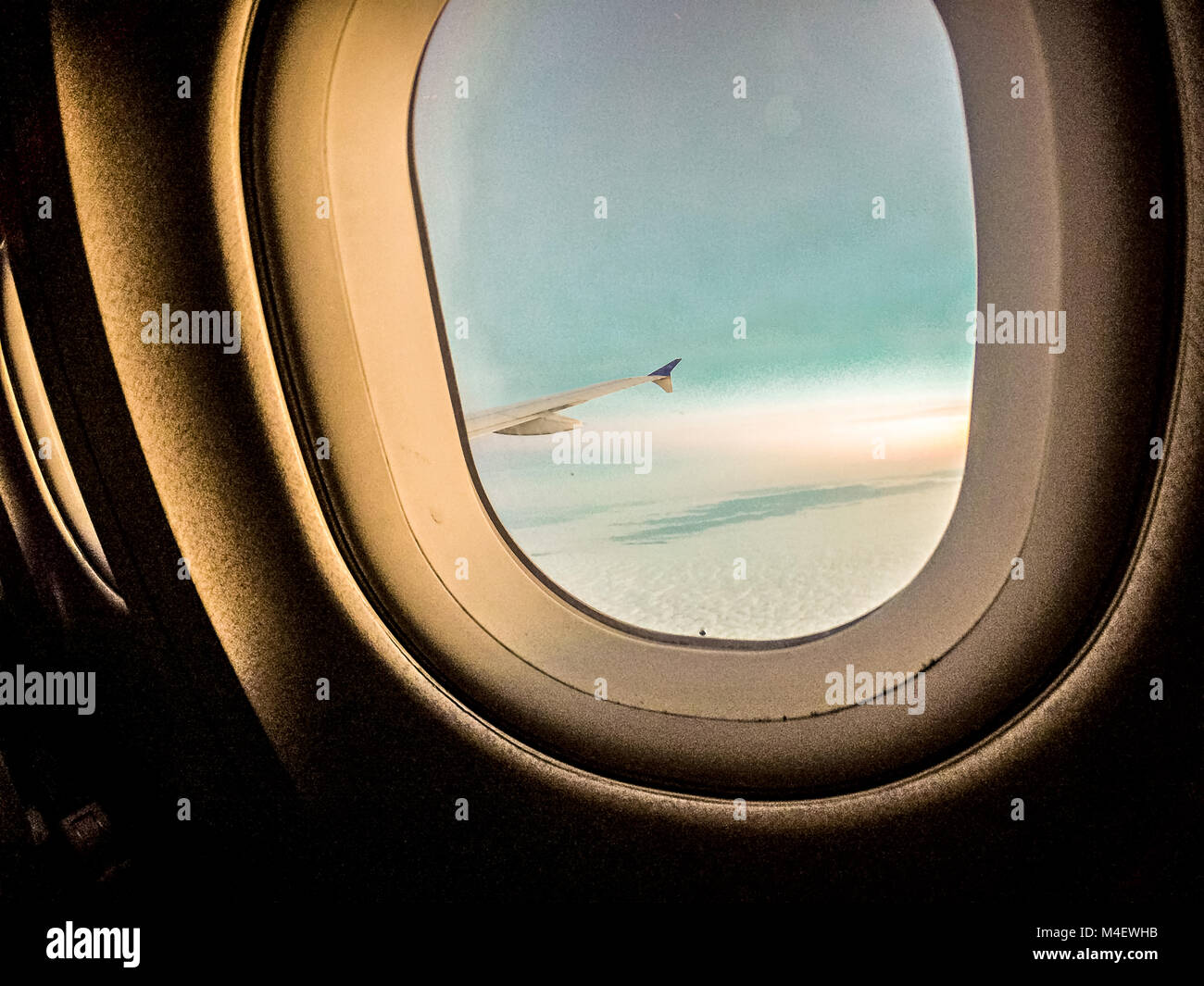 looking out of airplane window during flight Stock Photo - Alamy