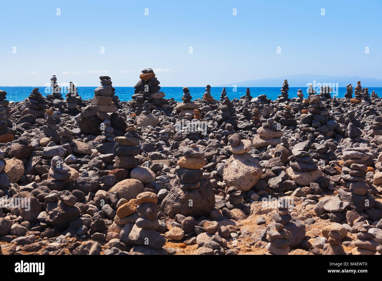 Stack of stones on beach Stock Photo - Alamy