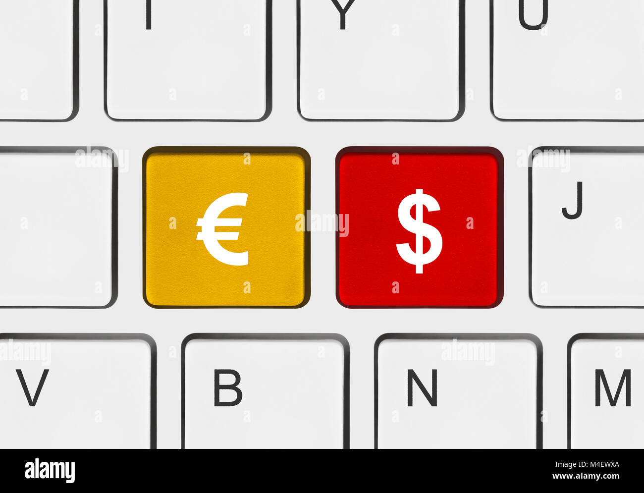 Computer keyboard with two money keys Stock Photo - Alamy