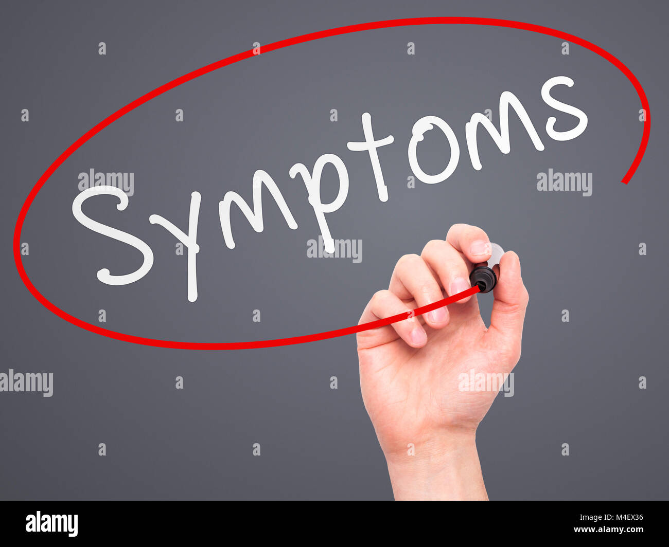 Man Hand writing Symptoms black marker on visual screen Stock Photo - Alamy