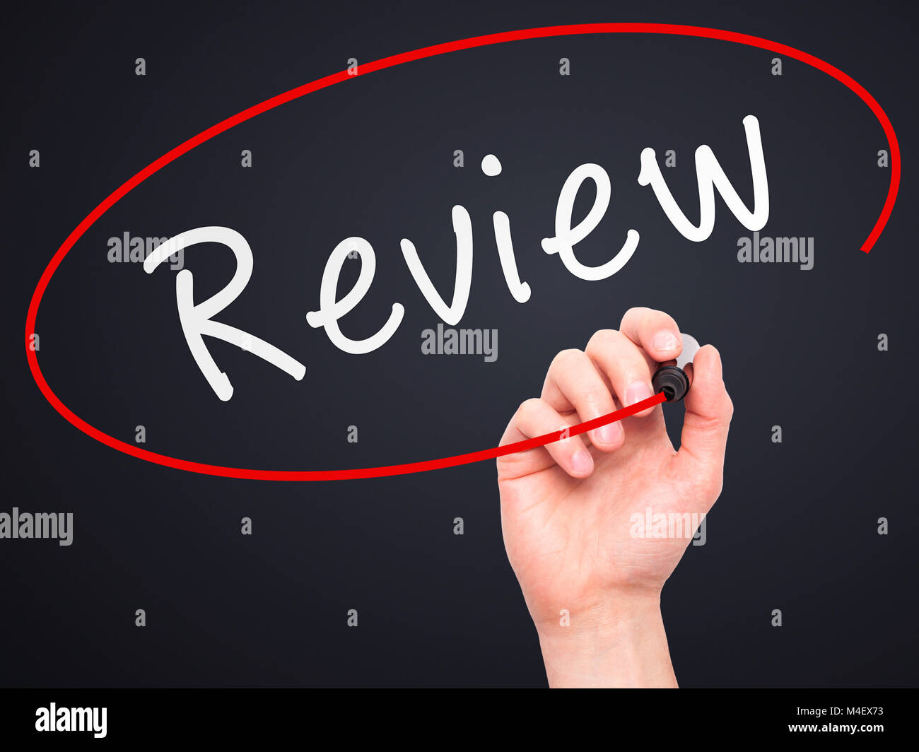 Man Hand writing Review with marker on transparent wipe board Stock ...