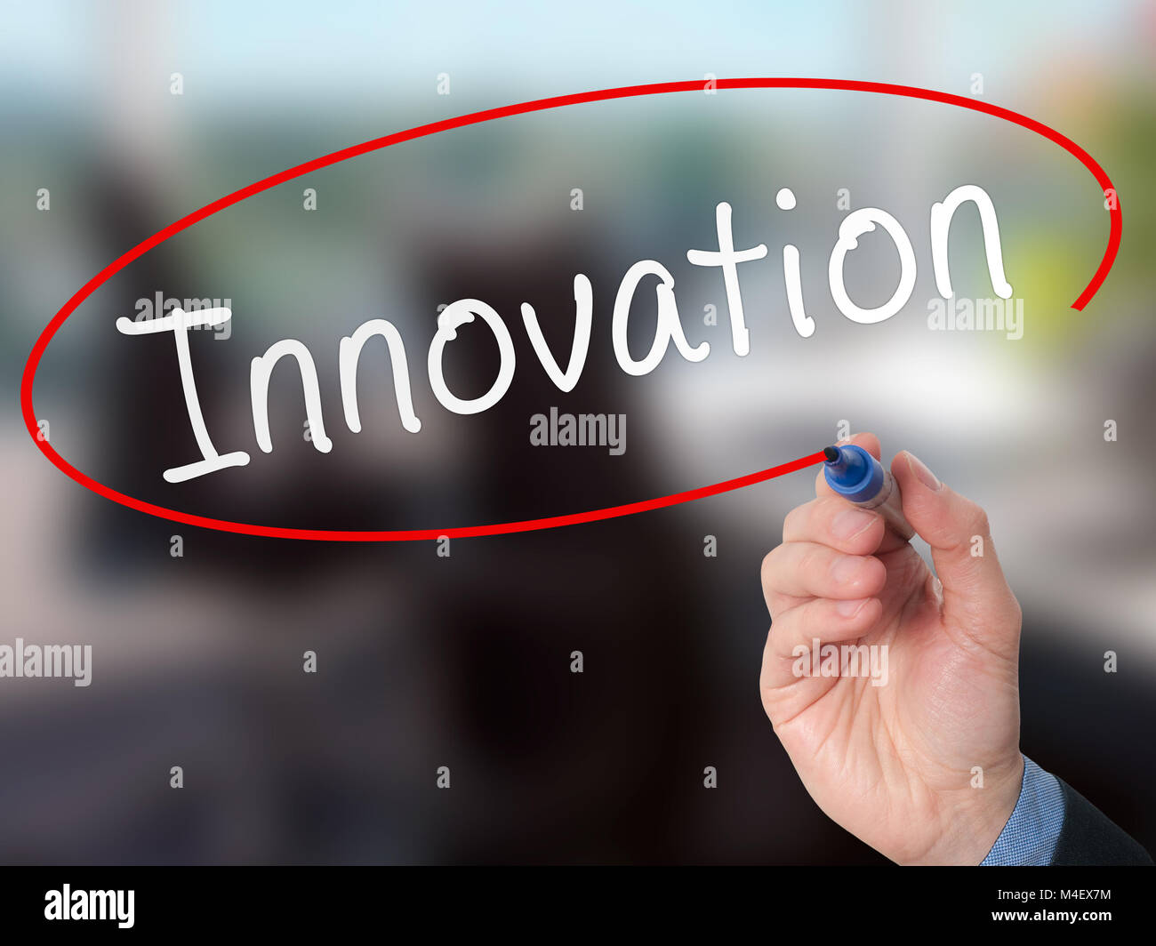 Man Hand writing Innovation with marker on visual screen Stock Photo ...