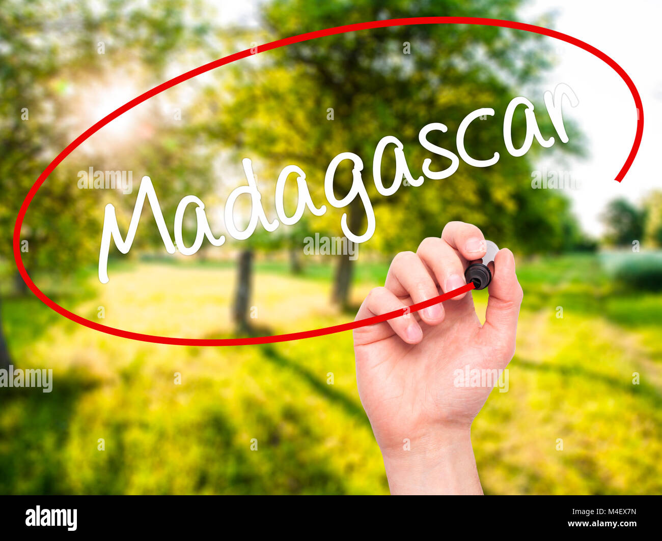 Man Hand writing Madagascar with black marker on visual screen Stock ...