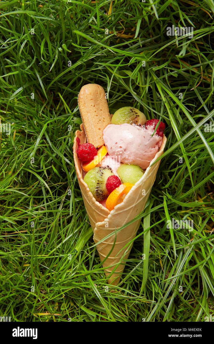 Berry ice cream in waffle cone Stock Photo - Alamy