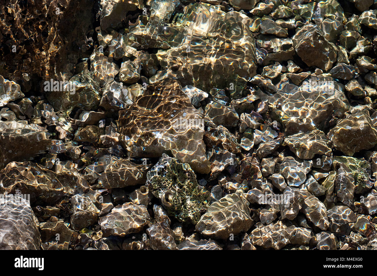 Sharp rocks in sea hi-res stock photography and images - Alamy