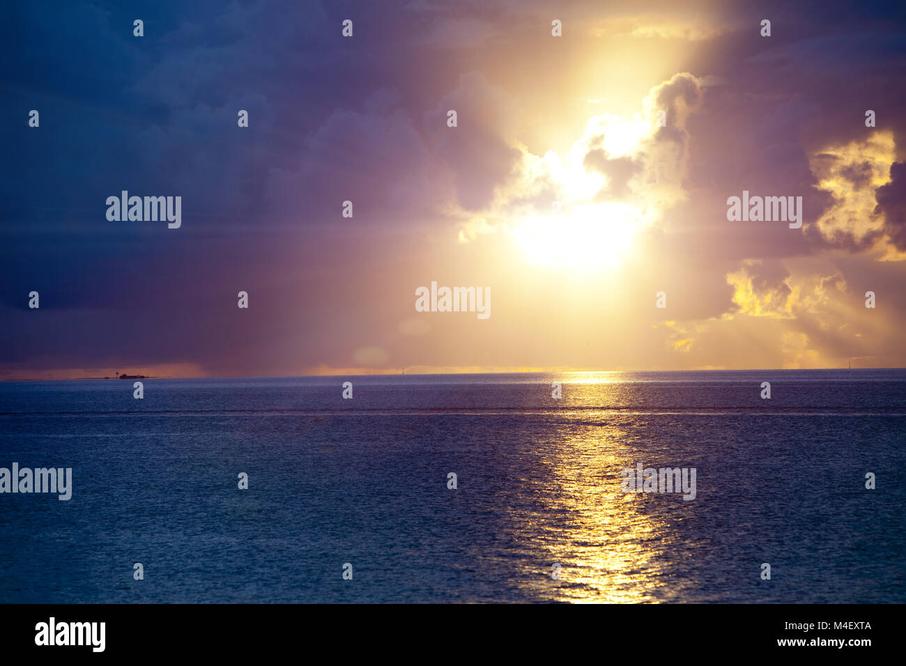 Ocean at sunset. Polynesia. Tahiti Stock Photo - Alamy