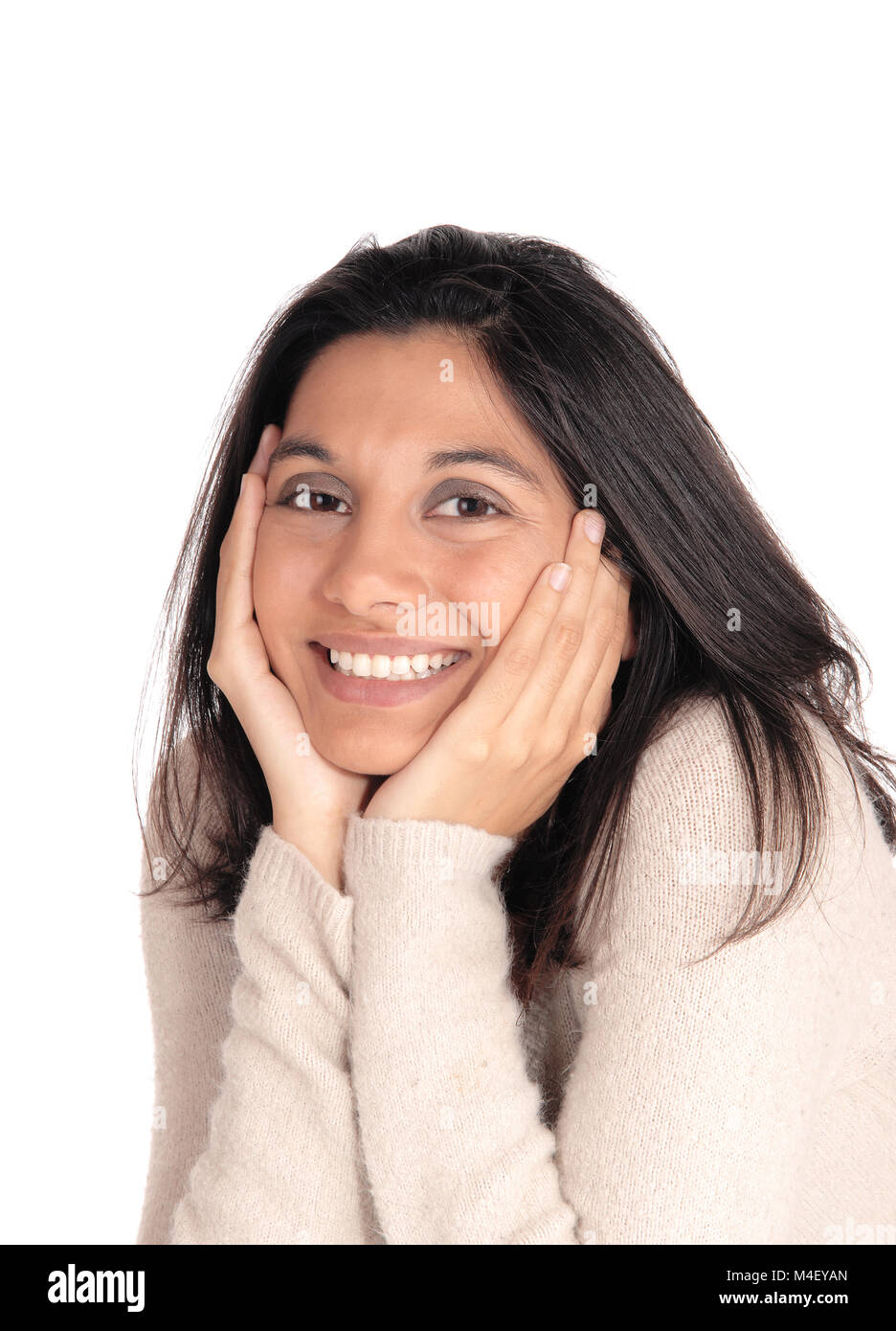 Happy woman holding her face in her hands Stock Photo - Alamy