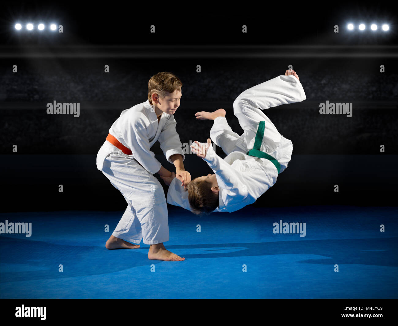 Two boys martial arts fighters at sports hall Stock Photo - Alamy