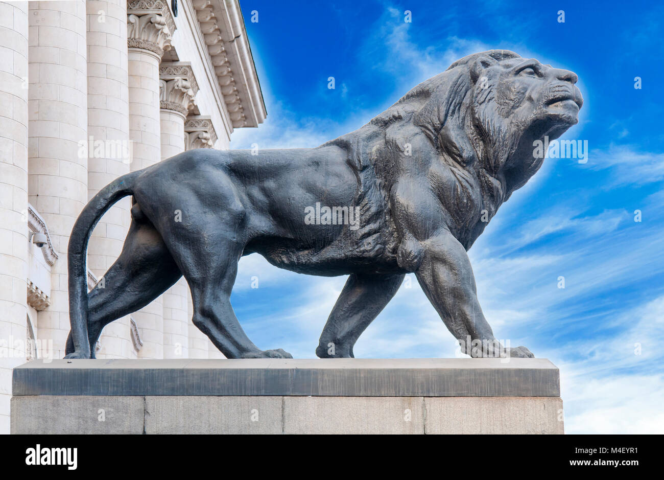 Big ancient archeology statue of lion Stock Photo - Alamy