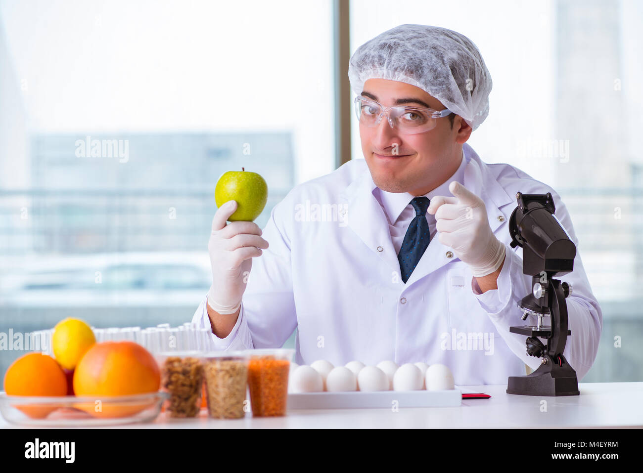 Nutrition expert testing food products in lab Stock Photo - Alamy