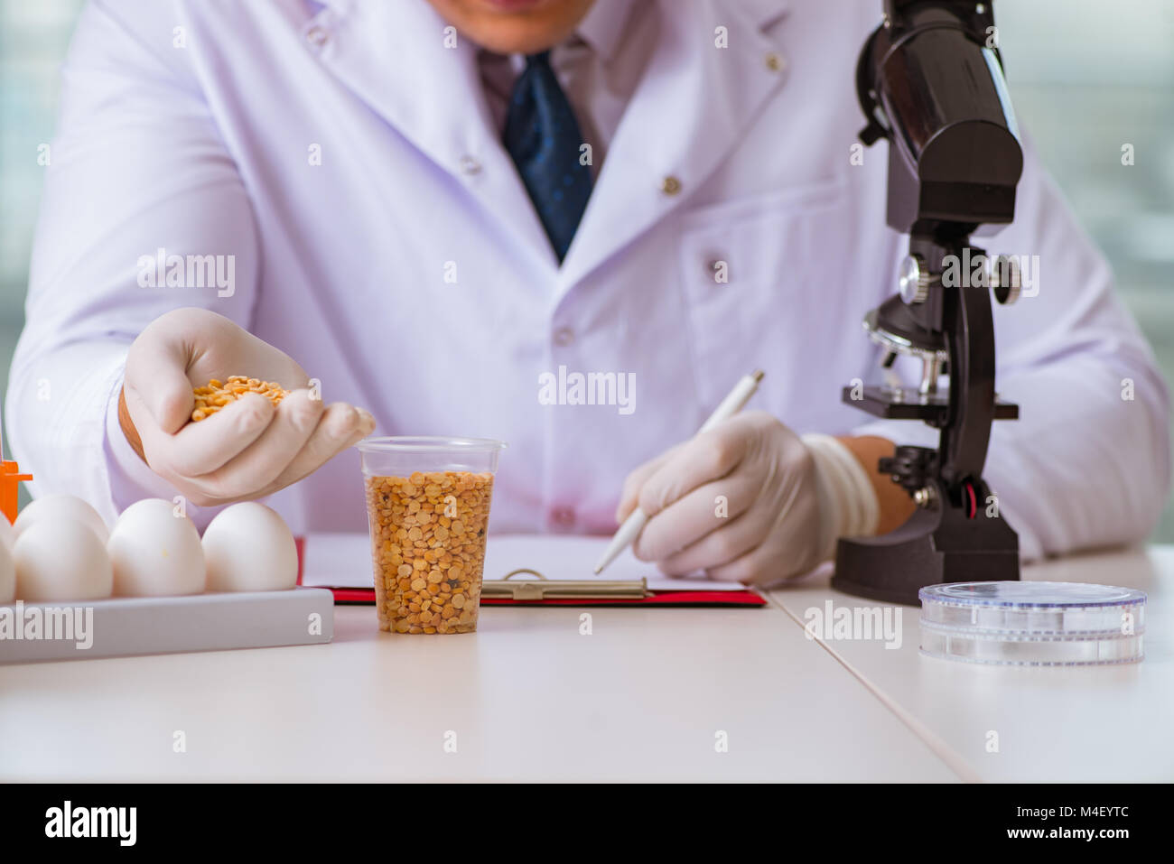 Nutrition expert testing food products in lab Stock Photo - Alamy