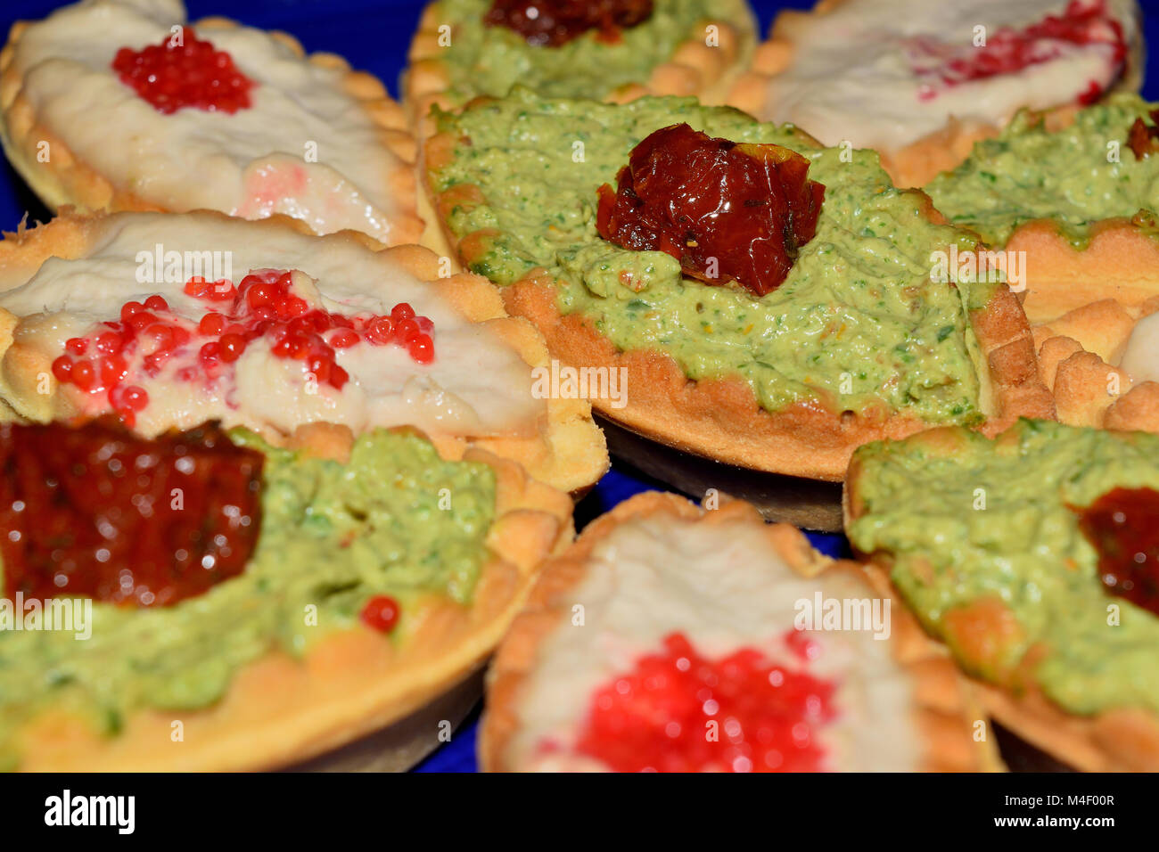 biscuits in the shape of boat stuffed with various creams Stock Photo ...