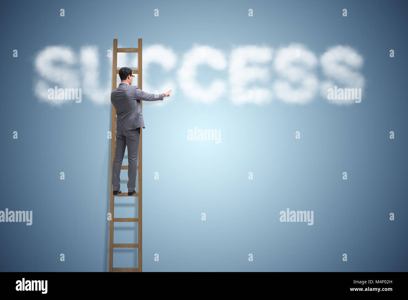 Businessman reaching success with career ladder Stock Photo - Alamy