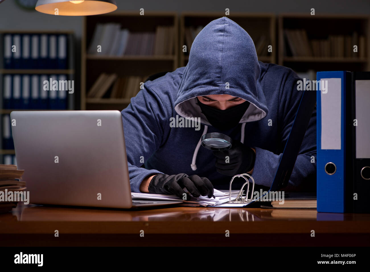Hacker stealing personal data from home computer Stock Photo - Alamy