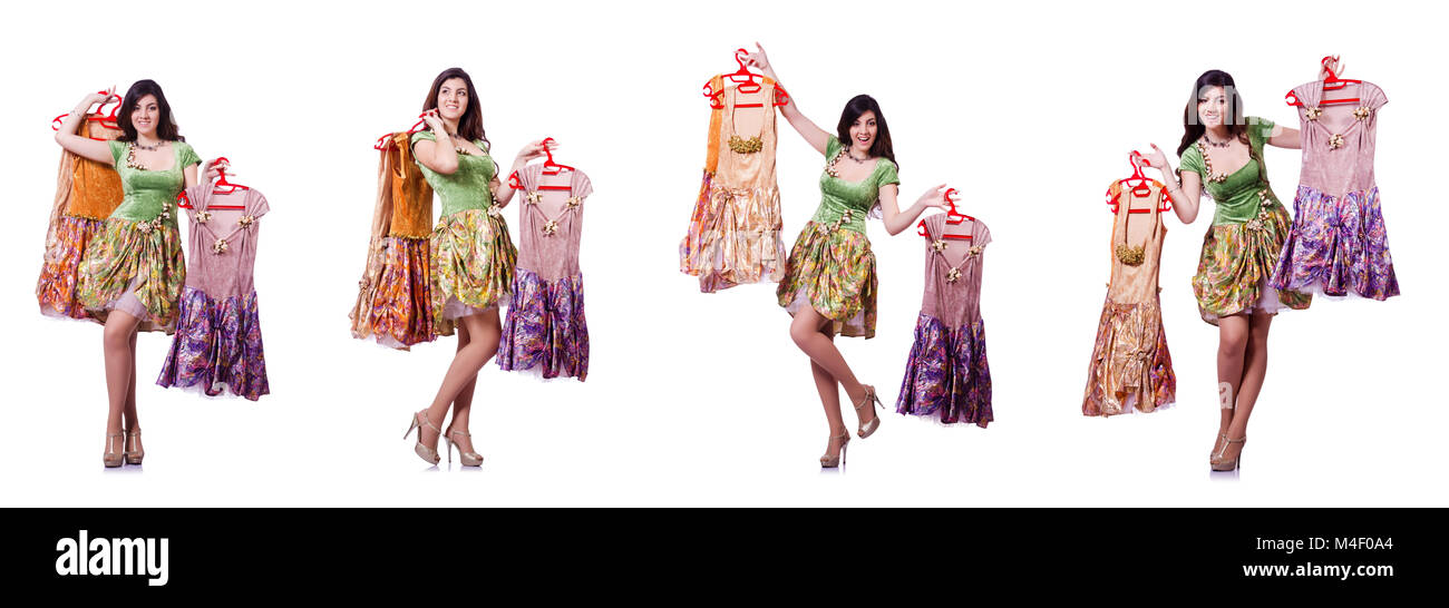 Woman trying to choose dress on white Stock Photo - Alamy