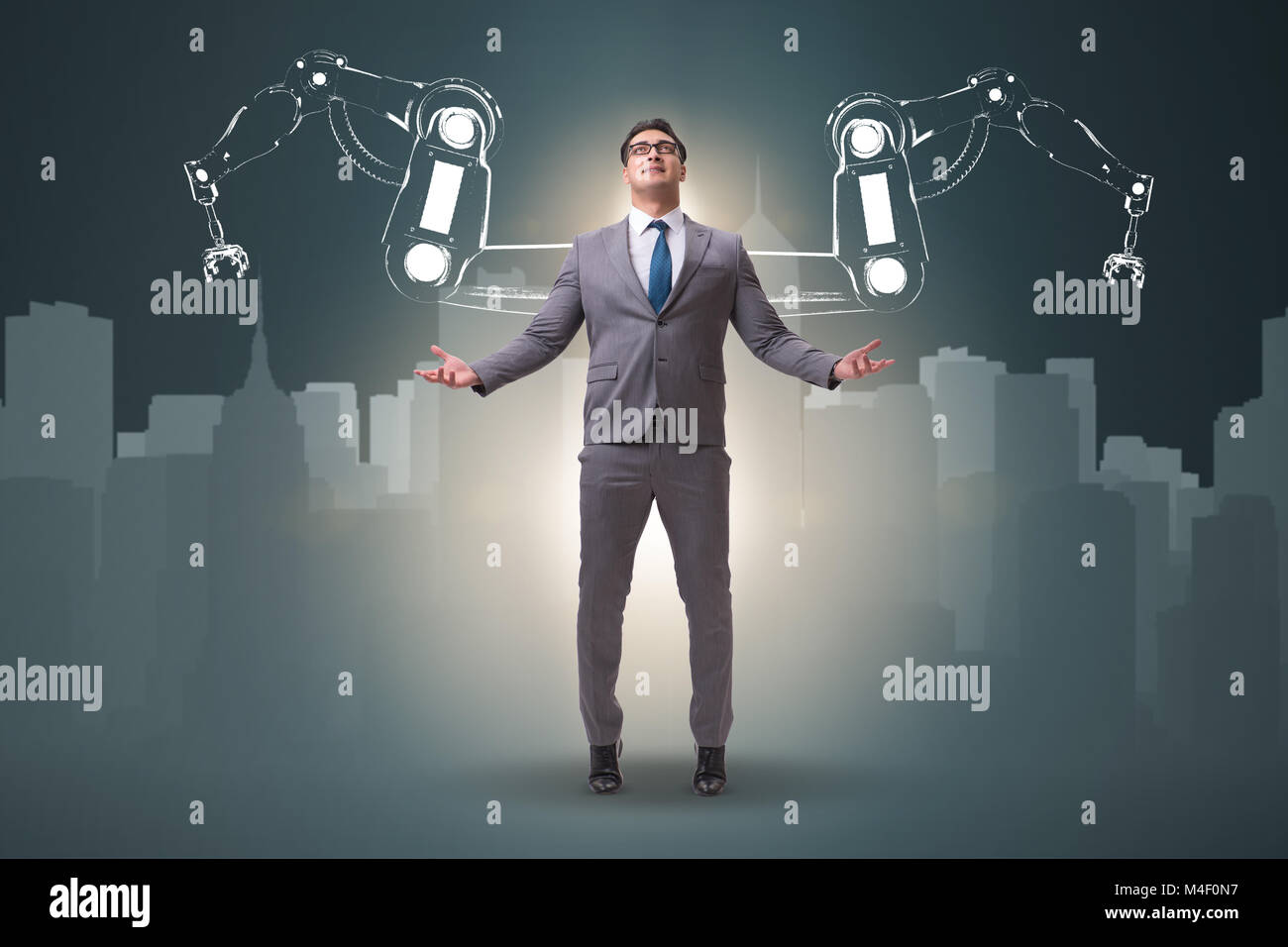 Businessman man with robotic arms Stock Photo - Alamy