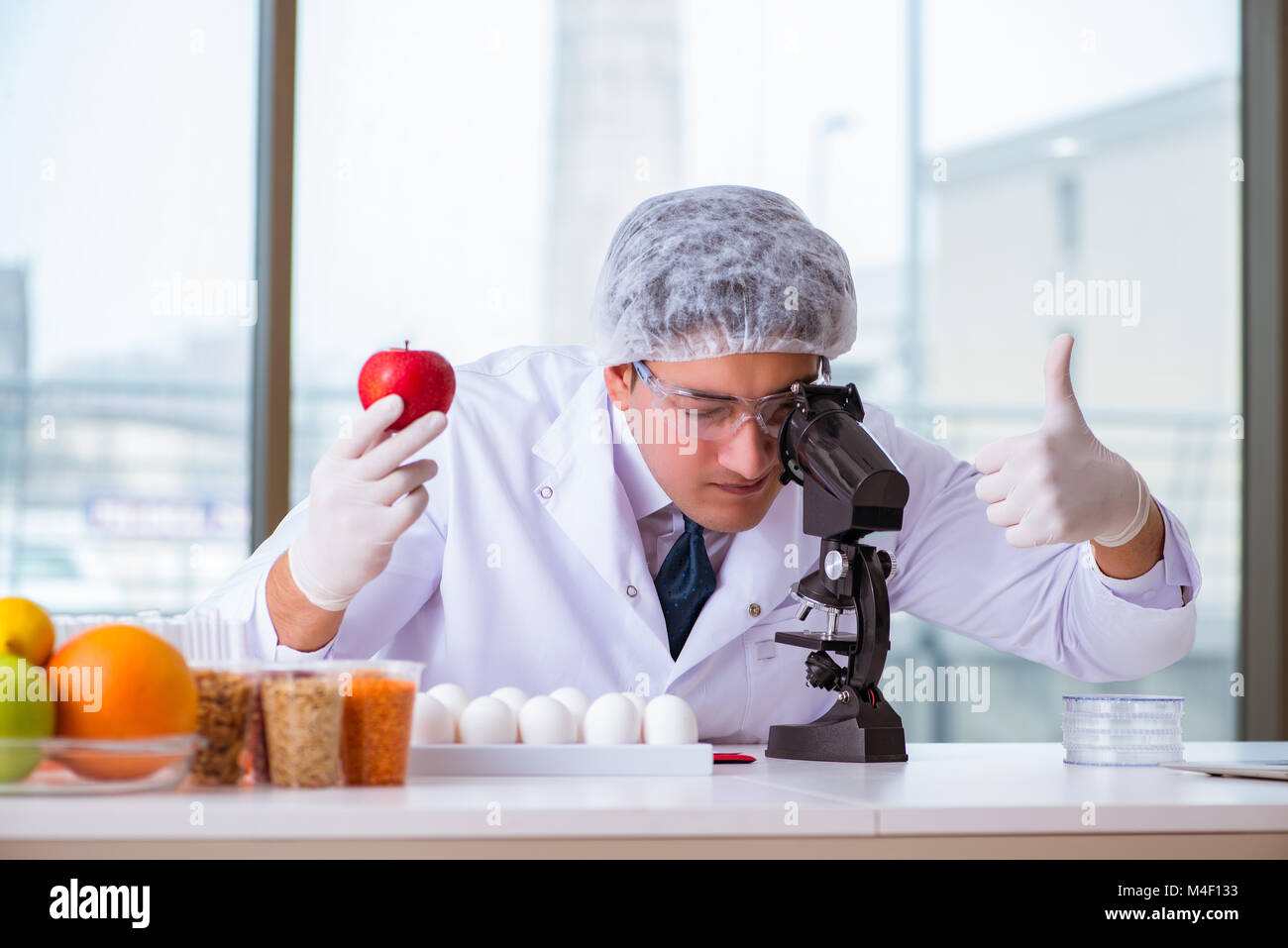 Nutrition expert testing food products in lab Stock Photo - Alamy
