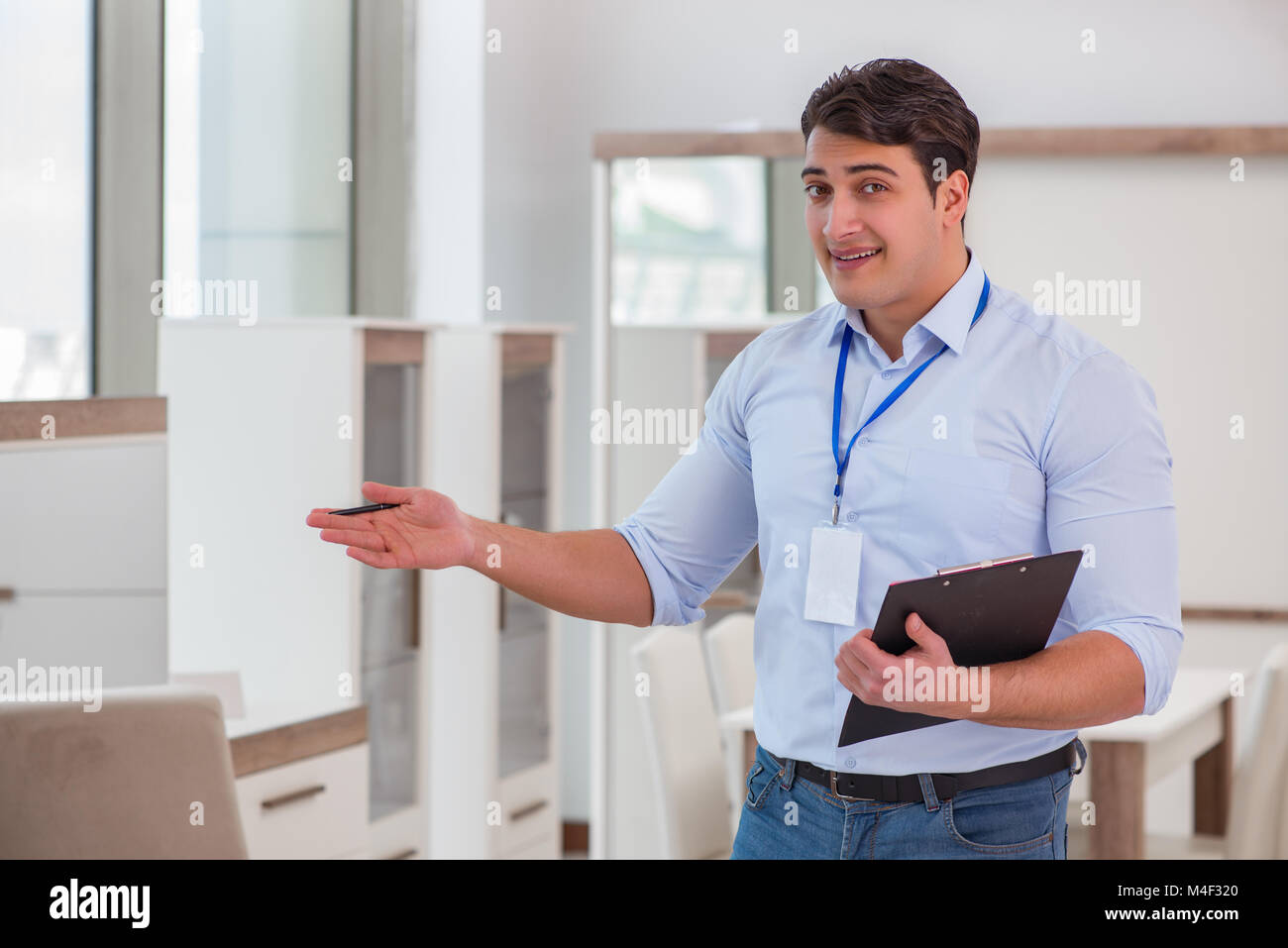 Salesperson in furniture store hi-res stock photography and images - Alamy
