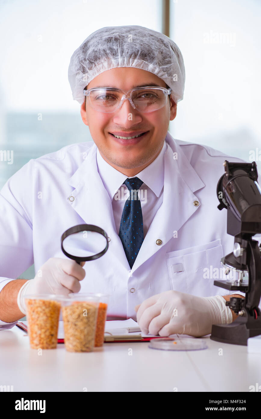 Nutrition expert testing food products in lab Stock Photo - Alamy