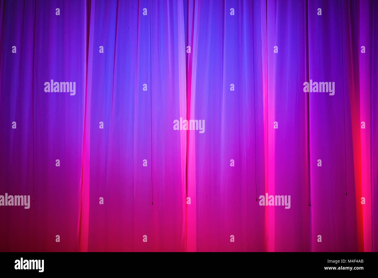 Bright stage curtain Stock Photo - Alamy
