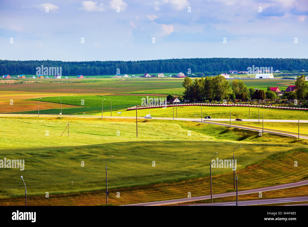 Fields and village Stock Photo - Alamy