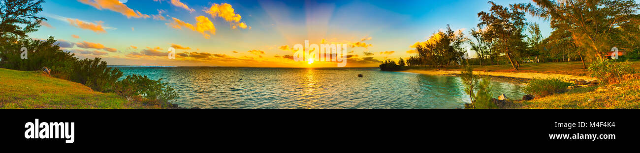 Coastal view at sunset. Mauritius. Panorama Stock Photo - Alamy
