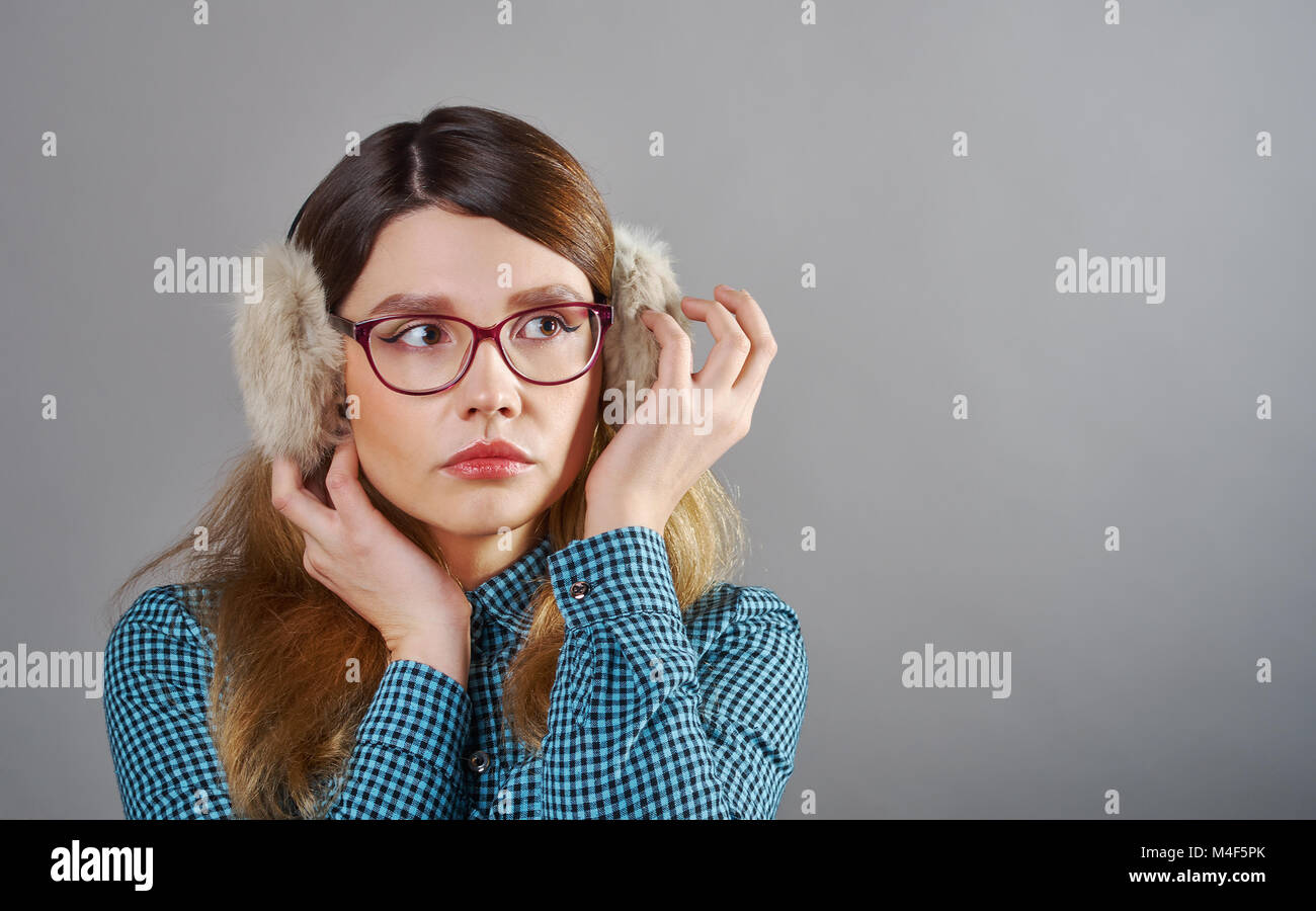 young pretty fair-haired teenage girl in glasses emotional posing ...