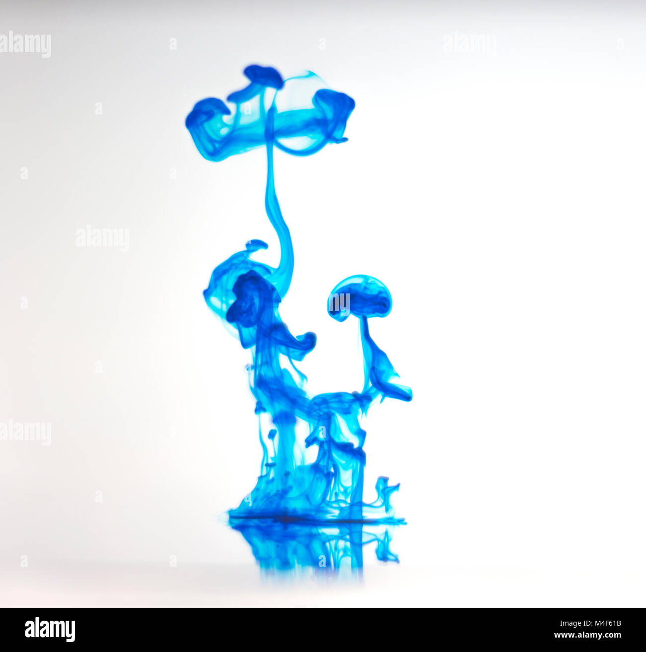 Colour Ink flowing in the water Stock Photo - Alamy