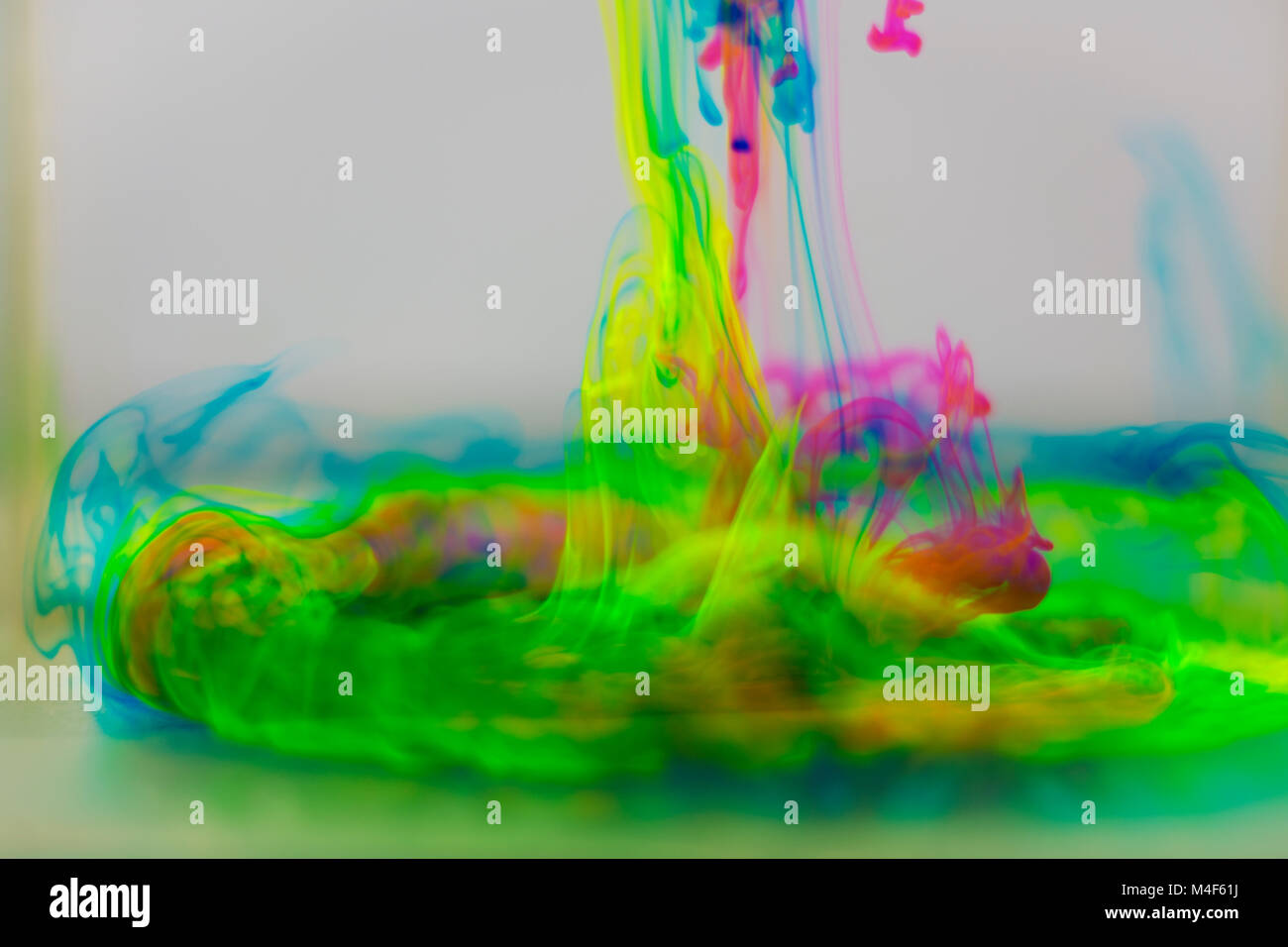 Colour Ink flowing in the water Stock Photo - Alamy
