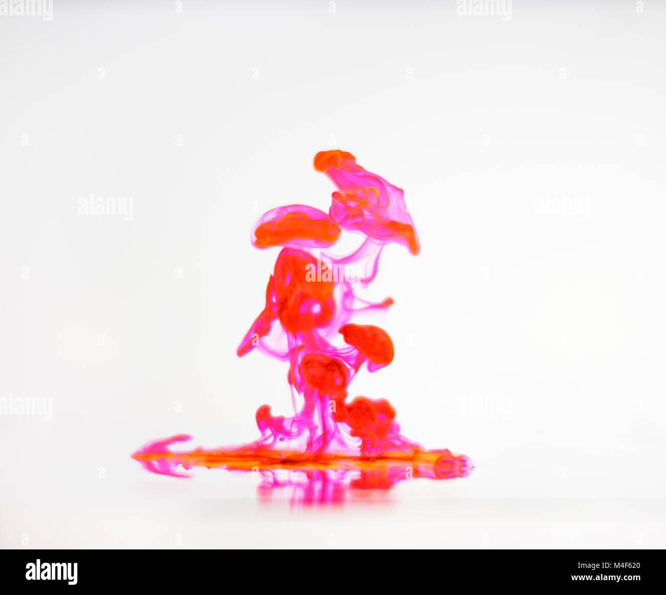 Colour Ink flowing in the water Stock Photo - Alamy