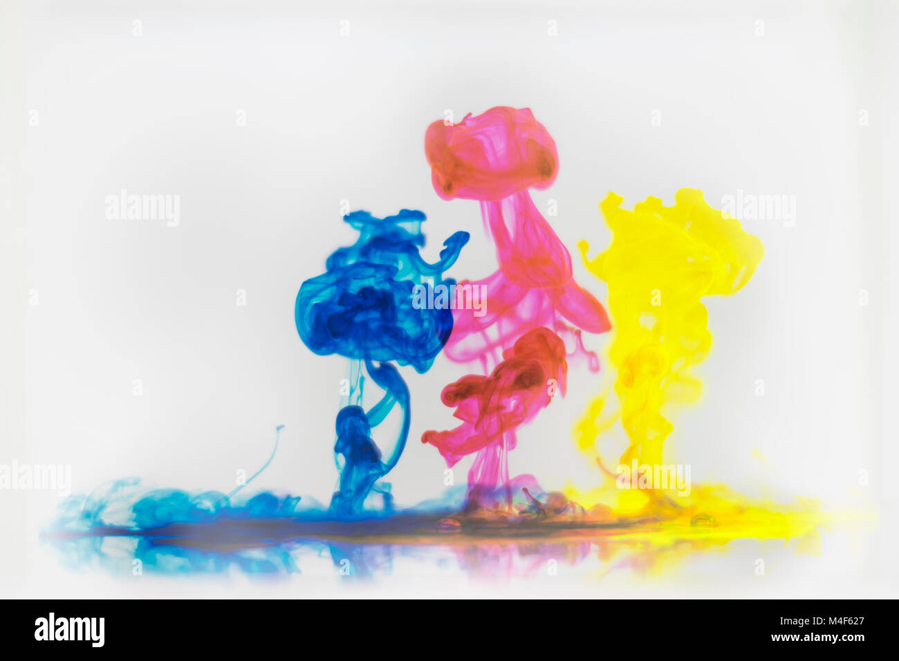 Colour Ink flowing in the water Stock Photo - Alamy
