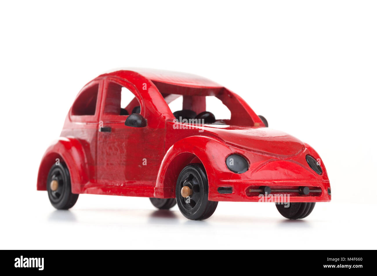 Red retro wooden toy car isolated on white background Stock Photo - Alamy