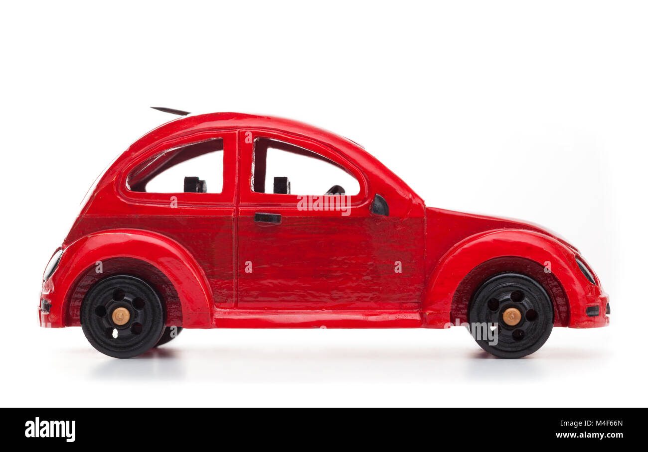 Red retro wooden toy car isolated on white background Stock Photo - Alamy