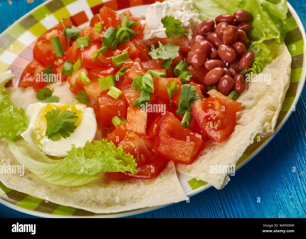 East African cuisine - Timatim Tomato Salad, Traditional assorted ...