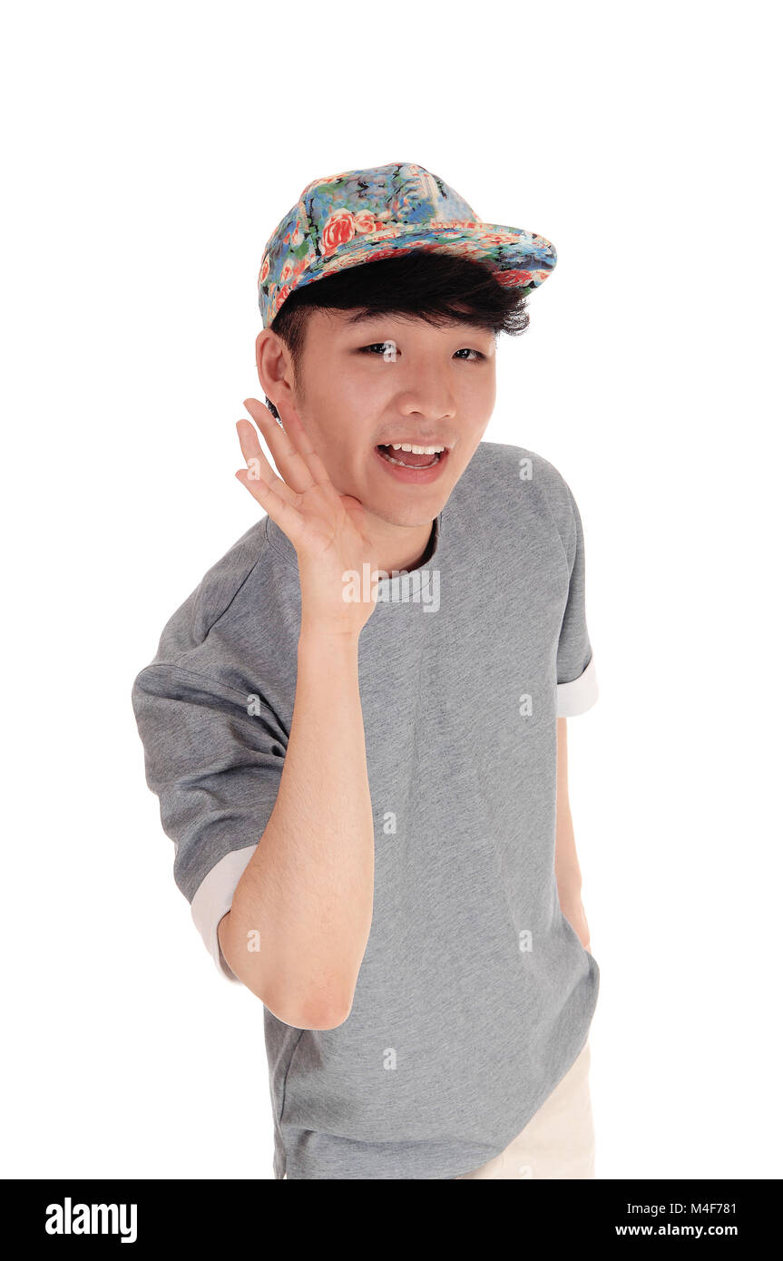 Happy Asian man with cap Stock Photo - Alamy