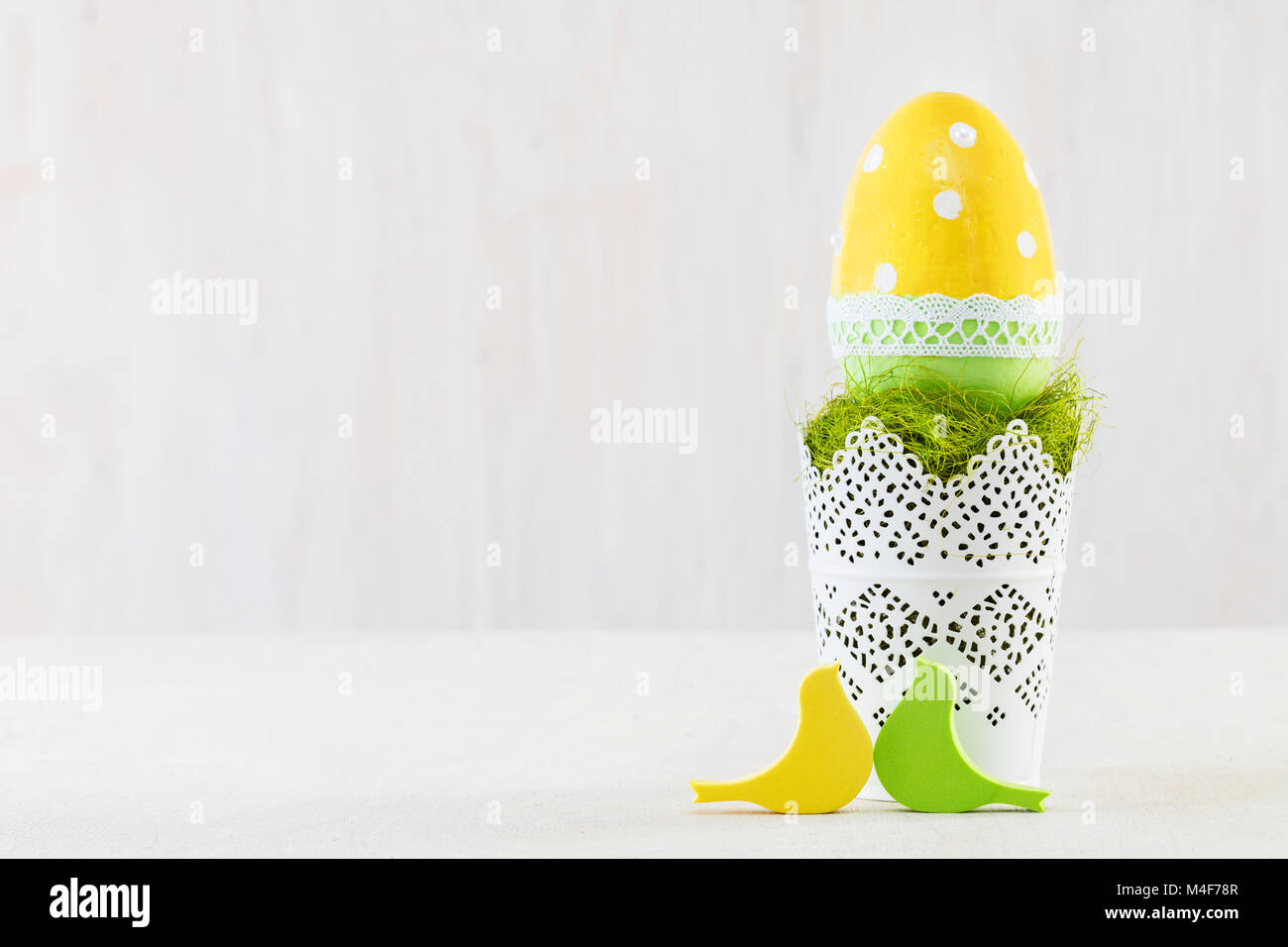 Single easter egg in a pot Stock Photo - Alamy