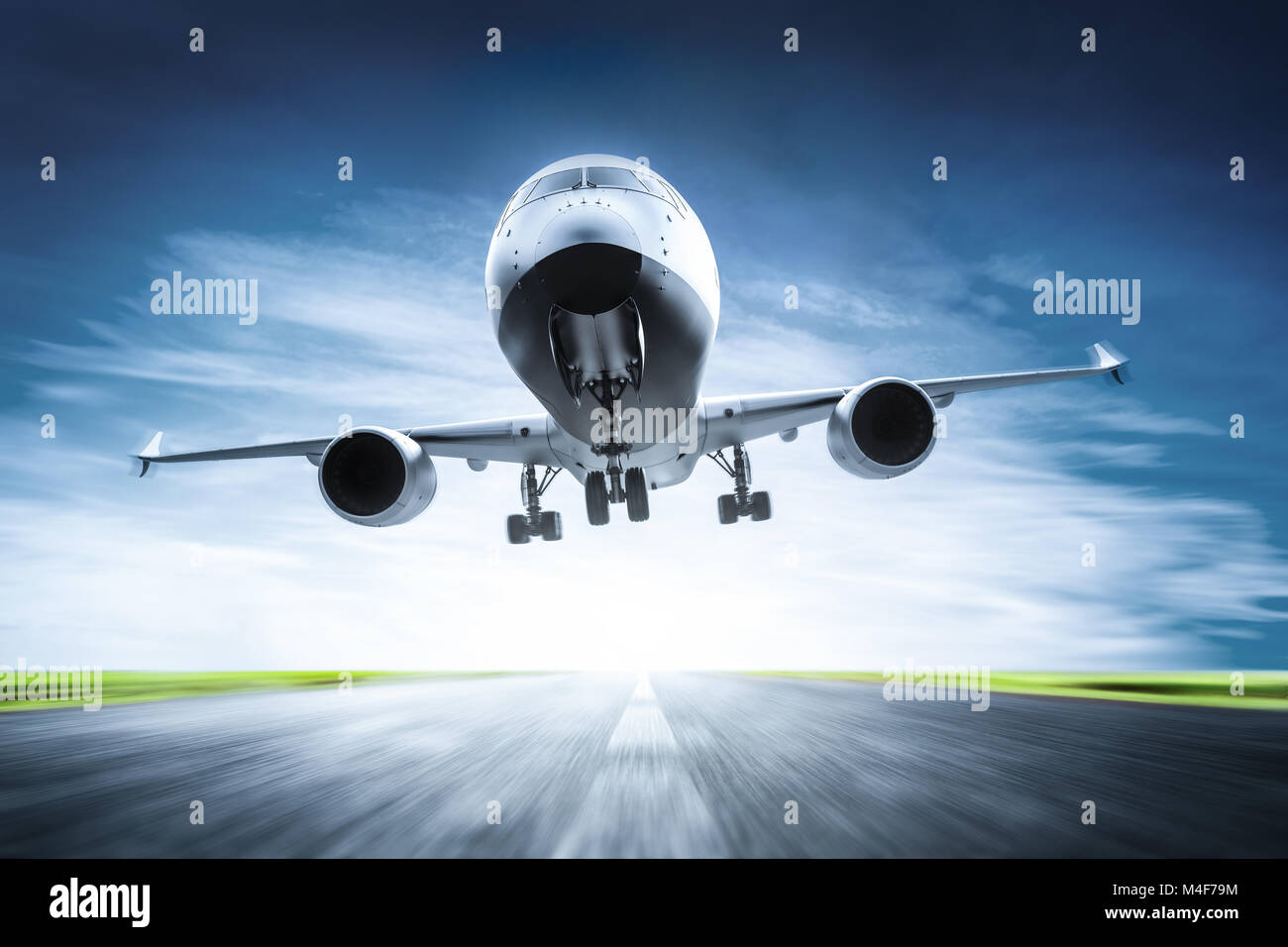 Passenger airplane taking off on runway Stock Photo - Alamy