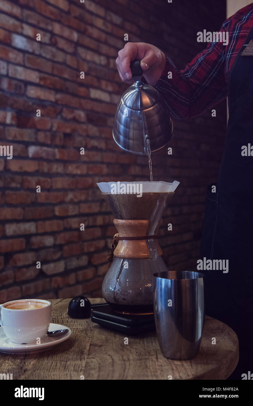 Barista brewing coffee Stock Photo - Alamy