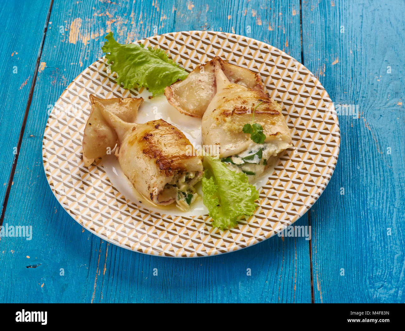 Gemisto Kalamari - Greek dish, stuffed squid with feta and cilantro ...