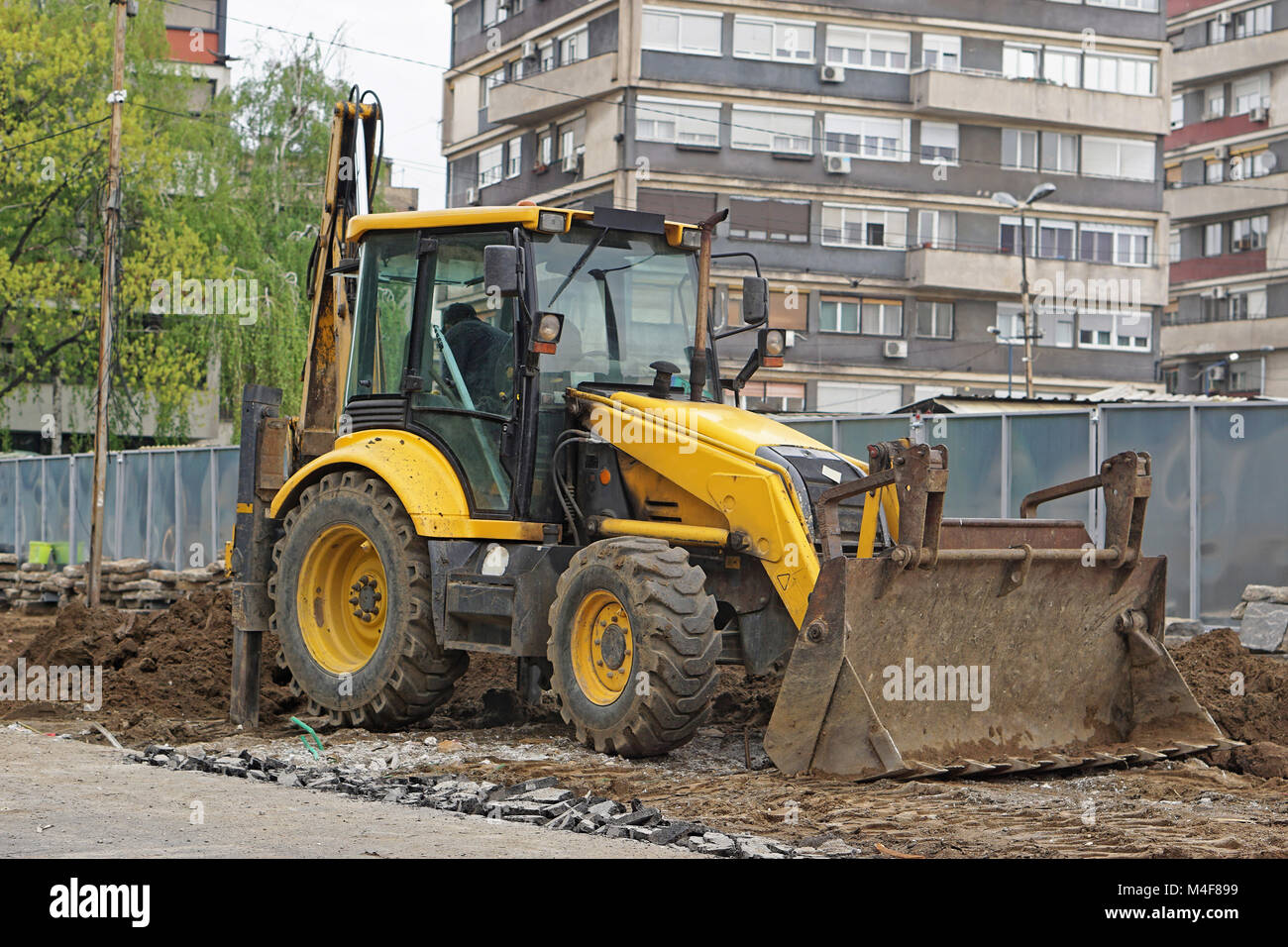 Backhoe loader machine street hi-res stock photography and images - Alamy