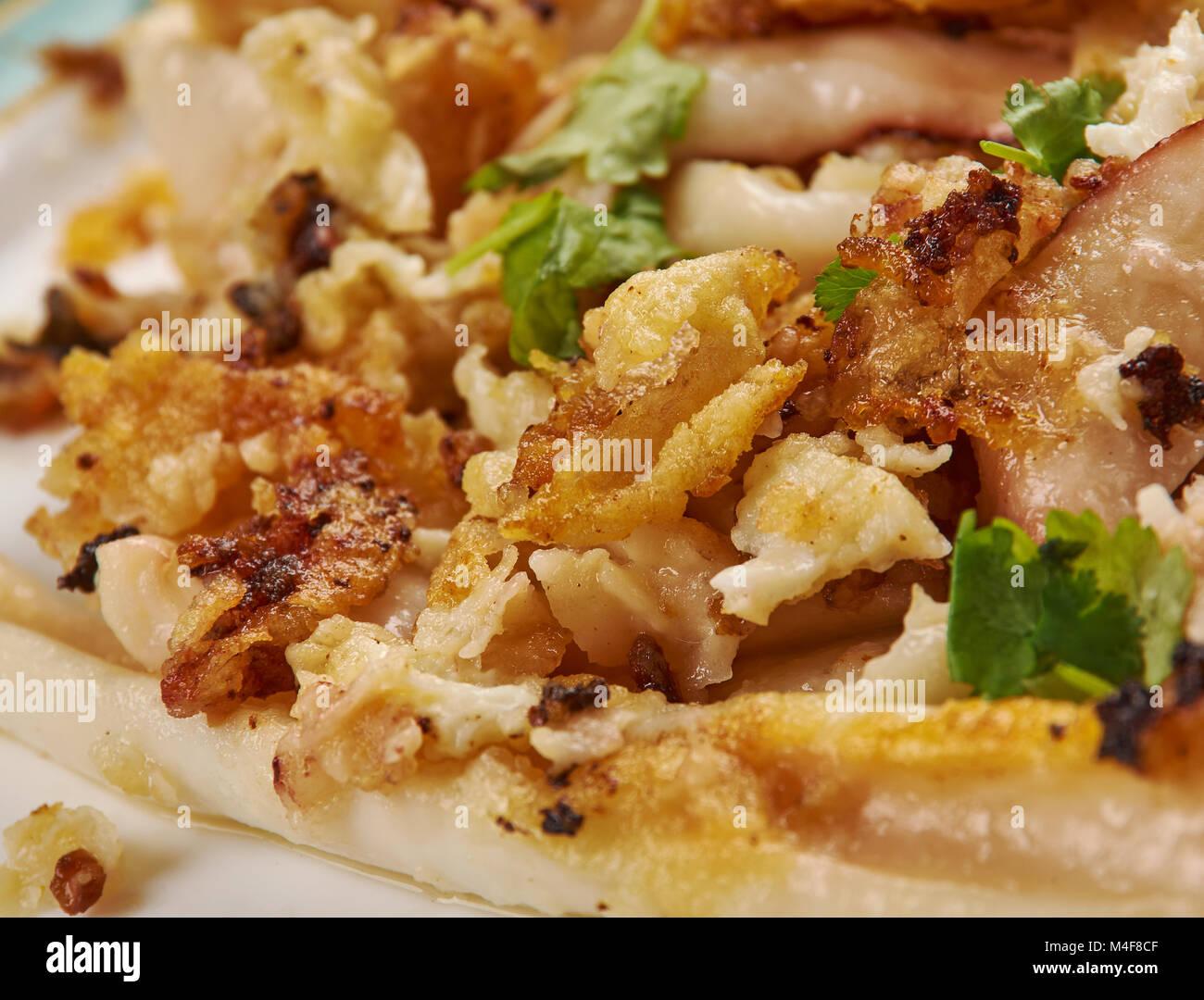Roman-style calamari, quid slices fried close up Stock Photo - Alamy