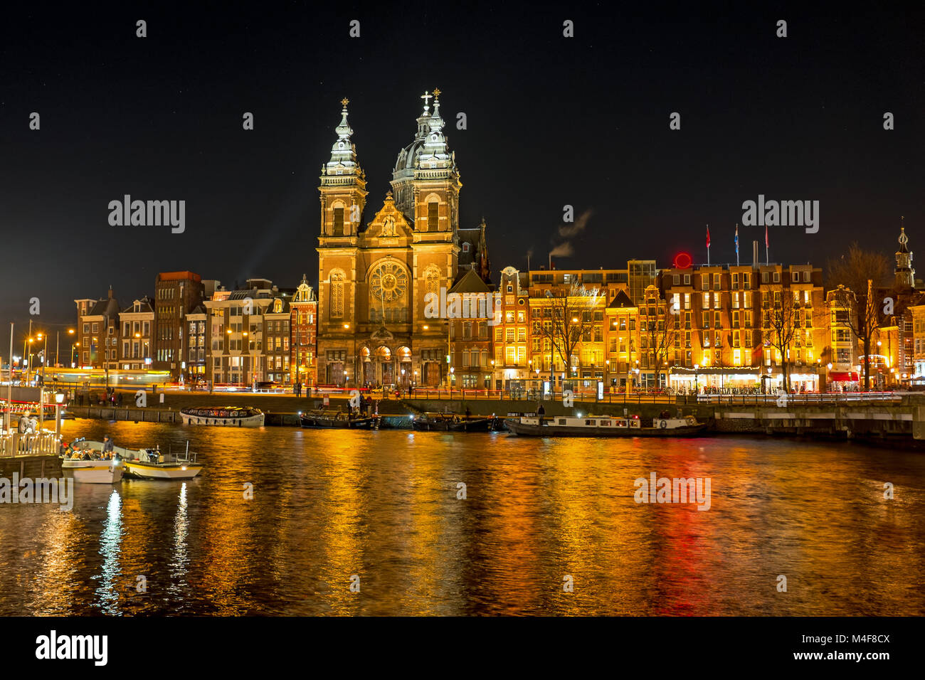 St. Niklaas church by night in Amsterdam the Netherlands Stock Photo ...
