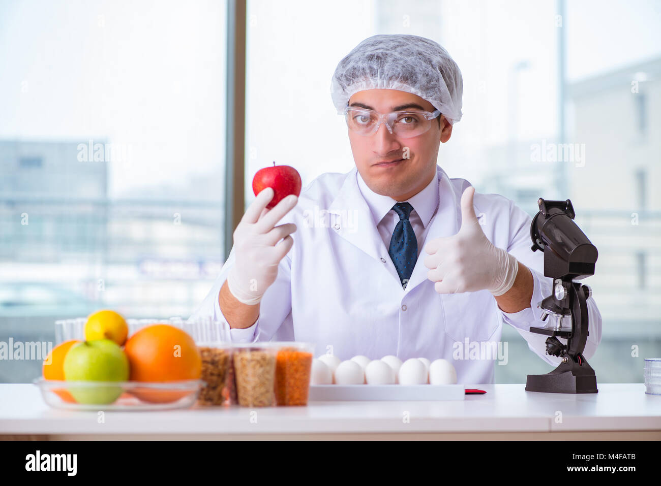 Nutrition expert testing food products in lab Stock Photo - Alamy