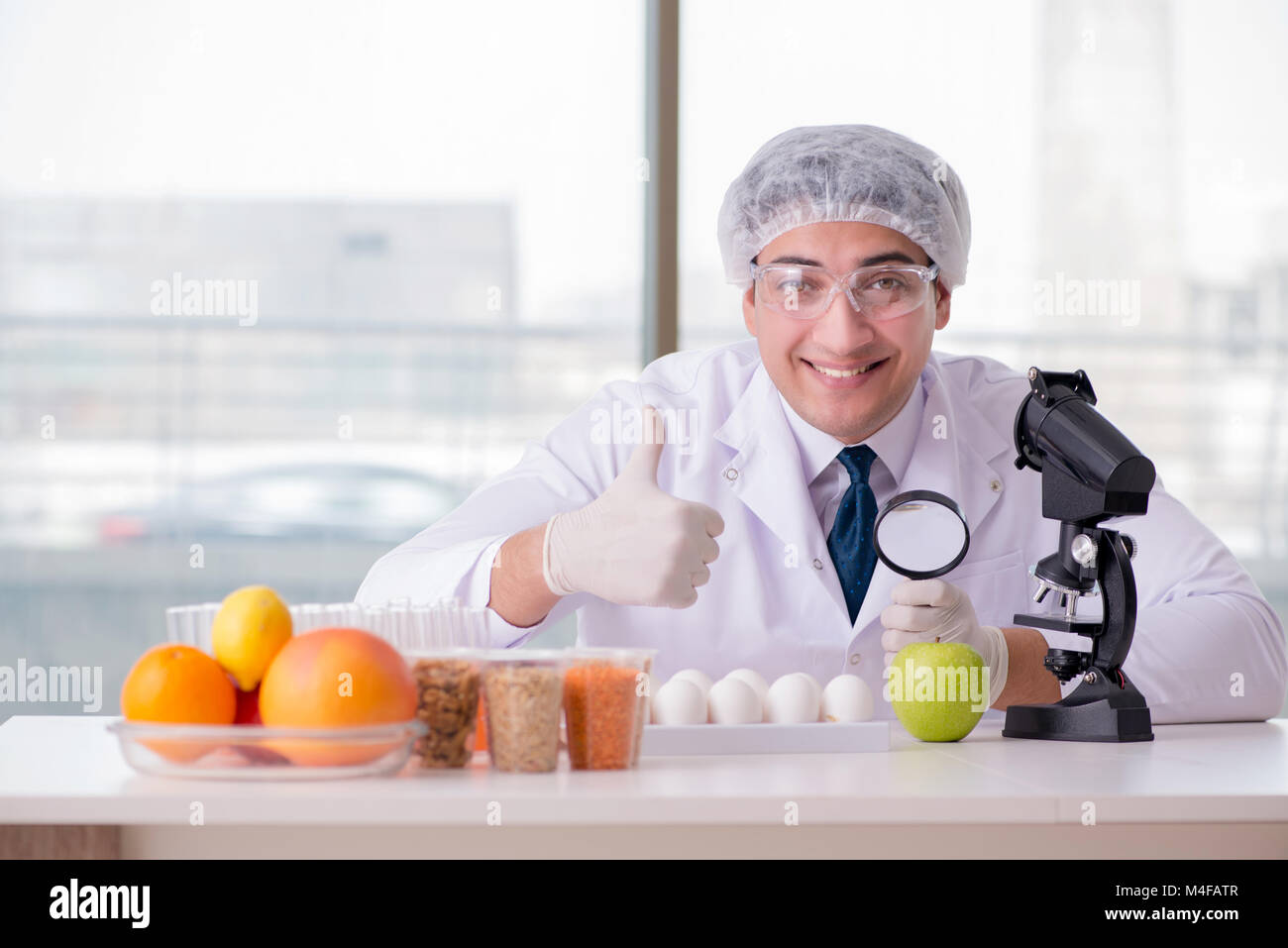 Nutrition expert testing food products in lab Stock Photo - Alamy