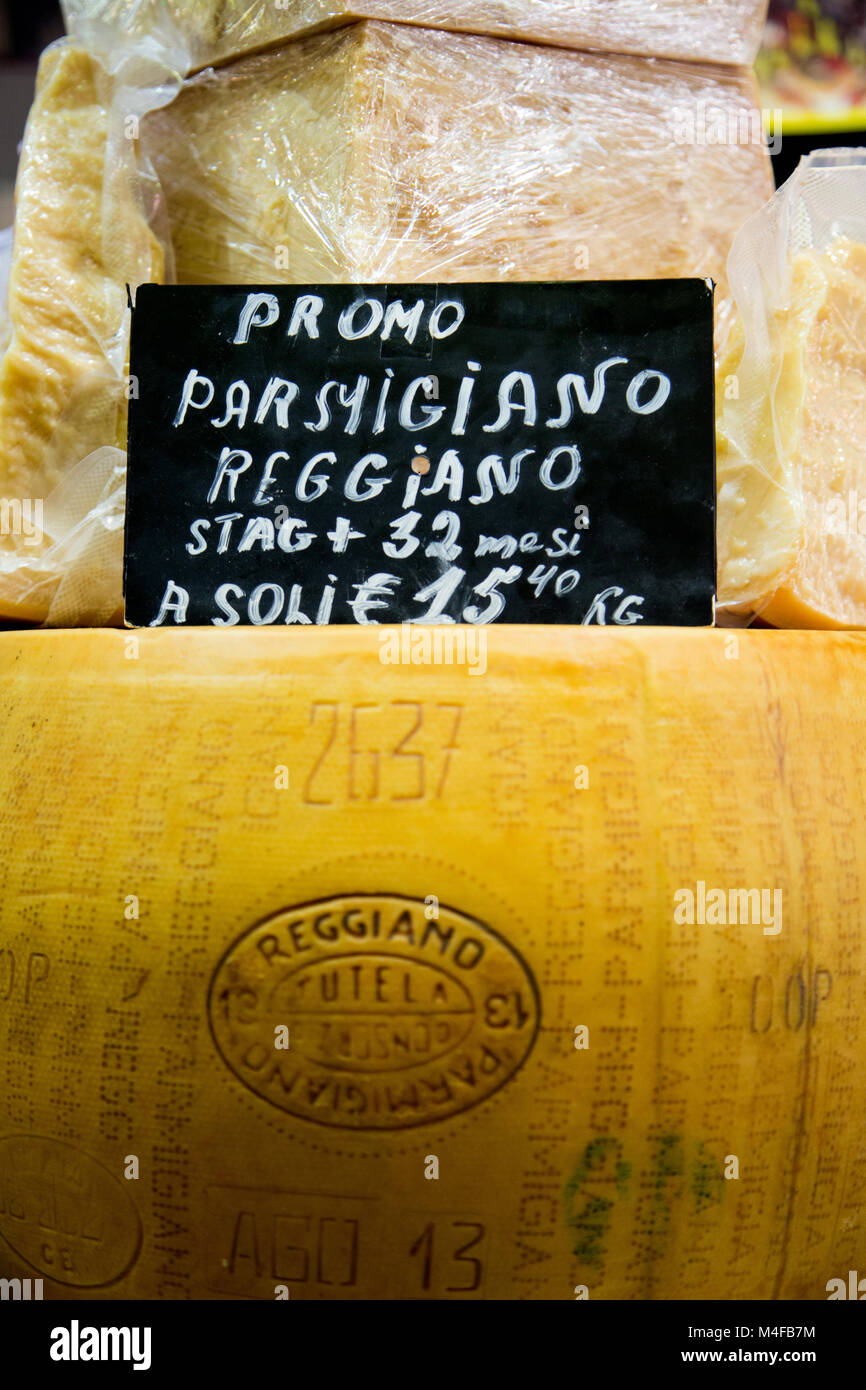 Blocks of cheese in Mercato Albinelli in Modena Italy Stock Photo - Alamy