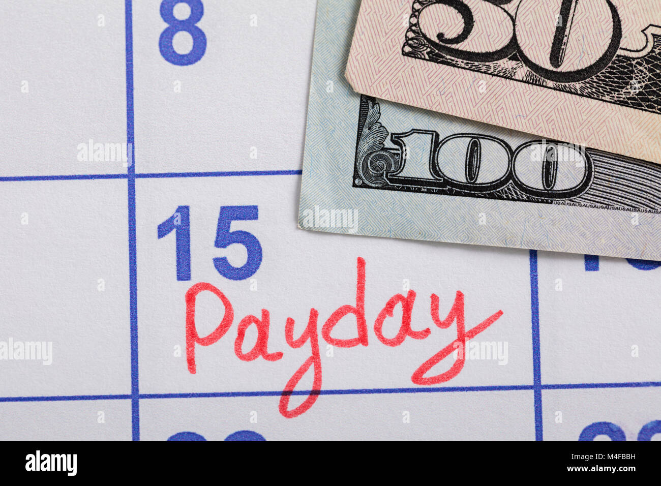 Close-up Of Pay Day Reminder On Calendar With Banknotes Stock Photo - Alamy